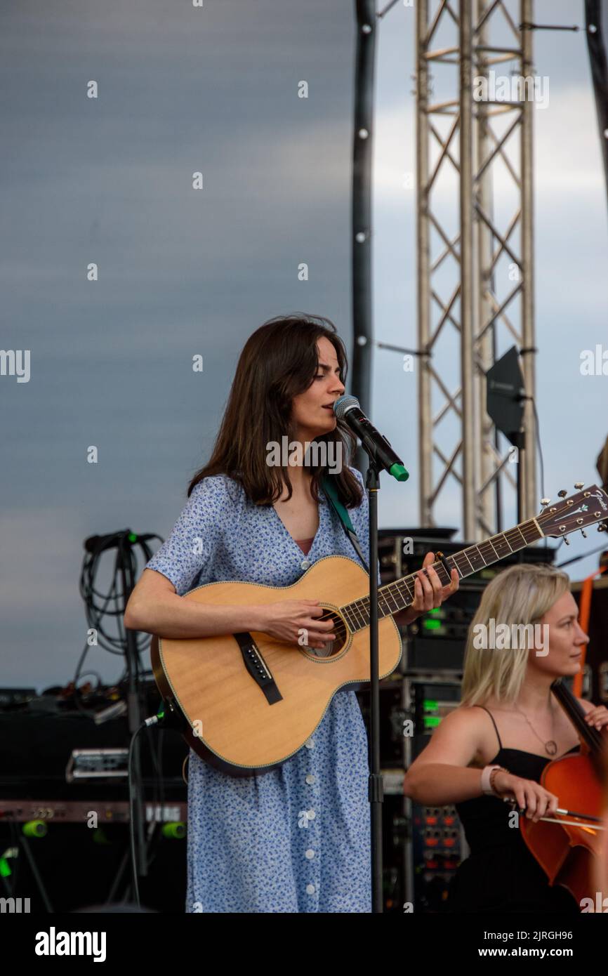 A vertical shot of Valeria Stoica singing at her live concert at ...
