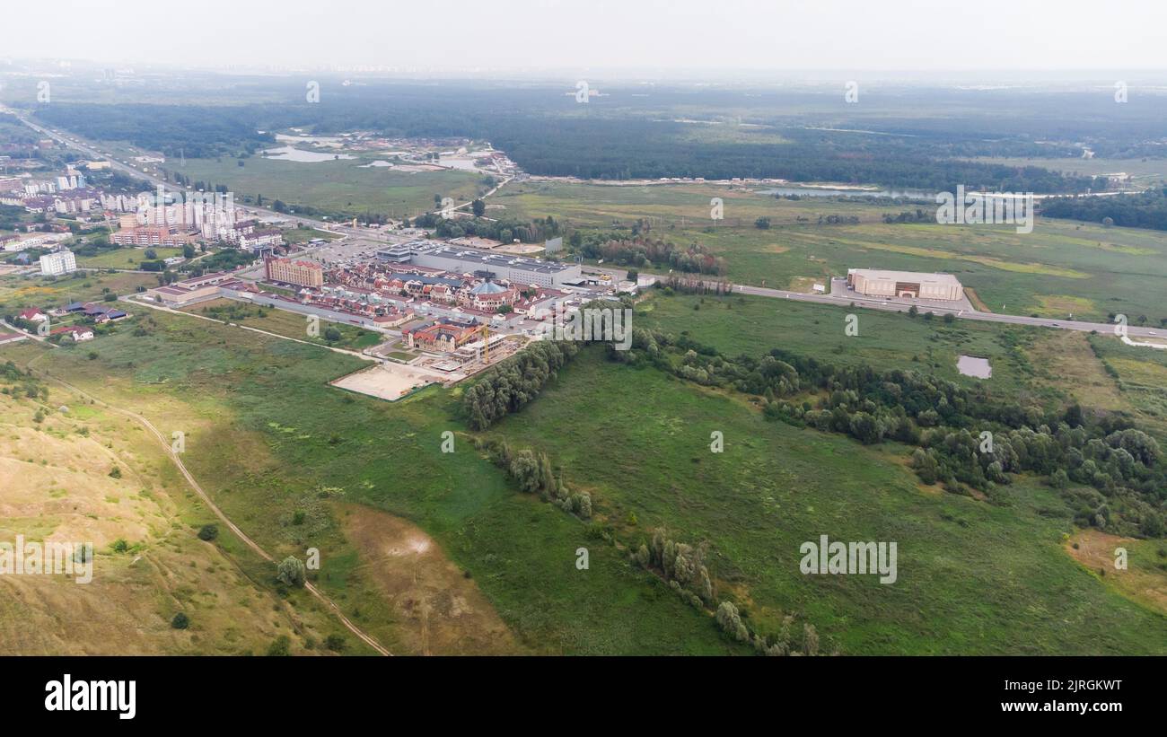 Extensive rural landscape with patches of fields, orchards and hedges ...