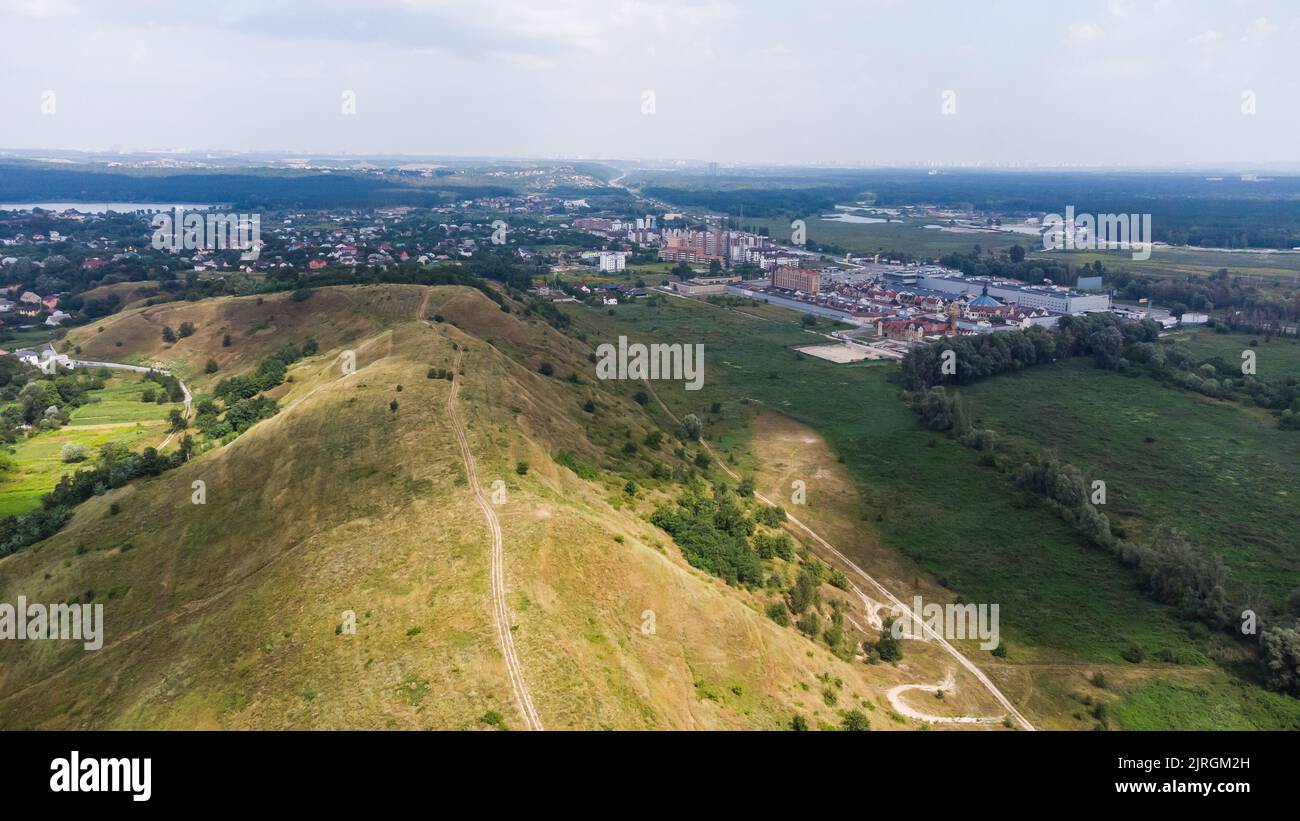 Extensive rural landscape with patches of fields, orchards and hedges ...
