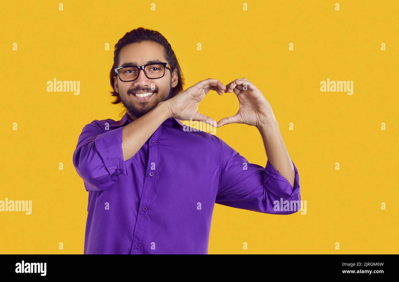 Man showing love sign hands hi-res stock photography and images - Alamy