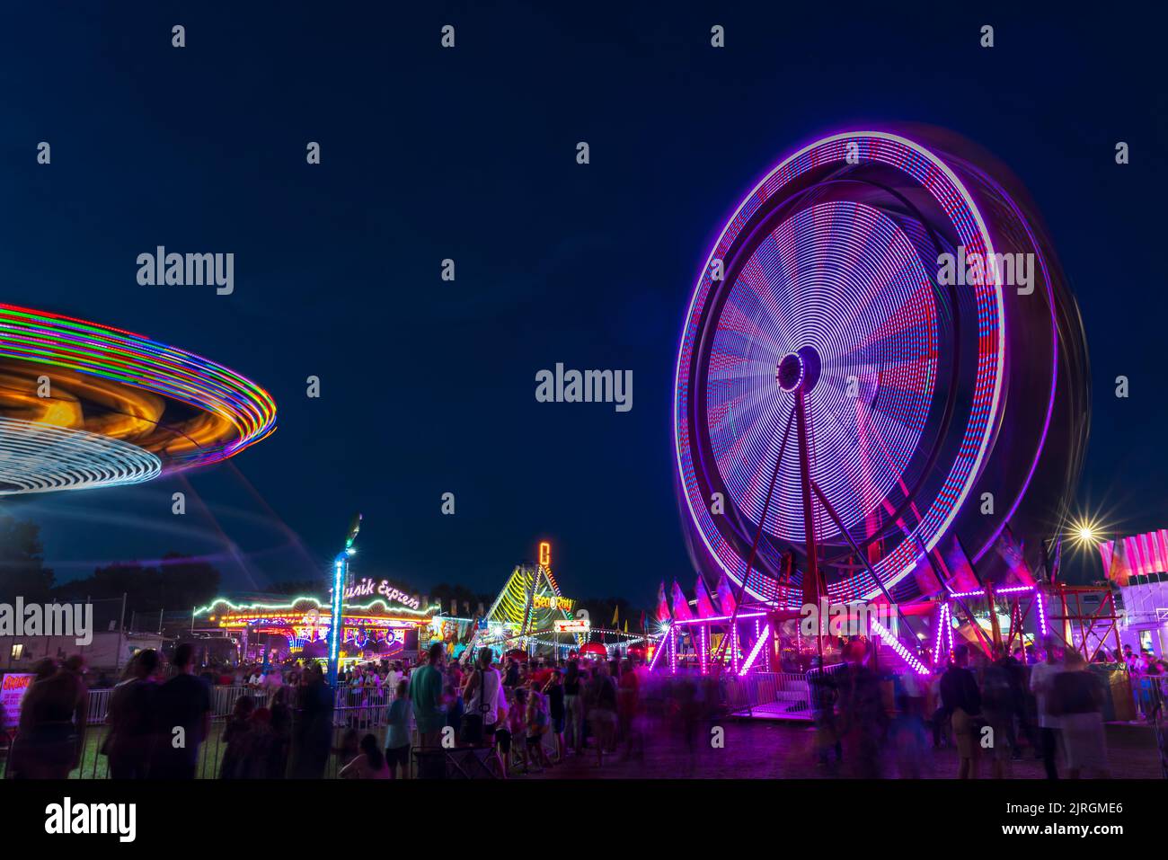 The Wonder Shows midway illuminated at night at the Harvest Festival in ...