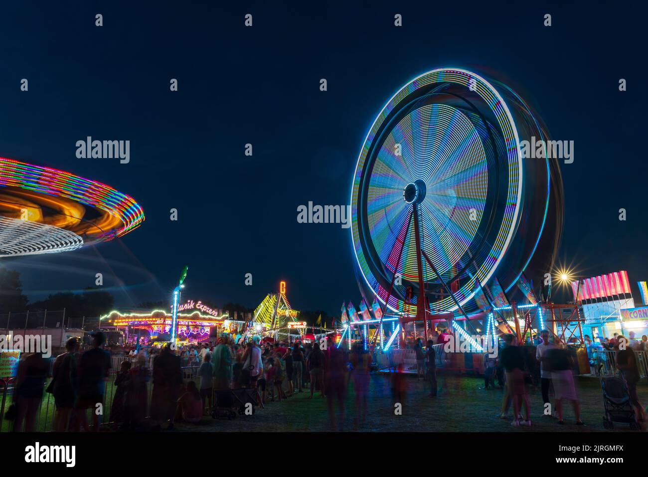 The Wonder Shows midway illuminated at night at the Harvest Festival in ...