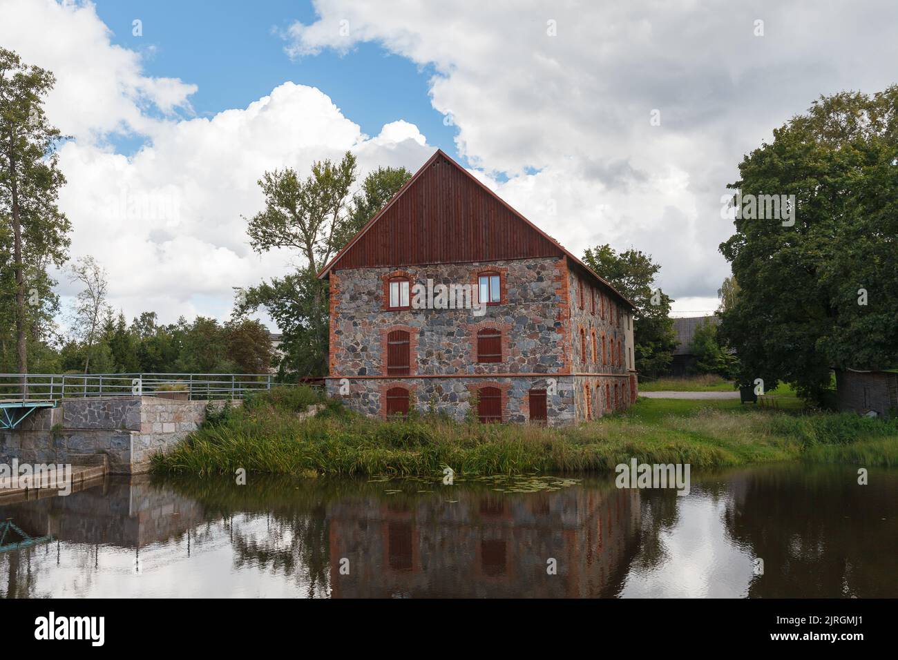 Rural house by the river Stock Photo - Alamy