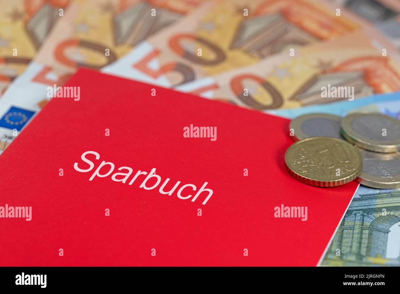Red bank book with the imprint "Sparbuch",translation "Savings book ...
