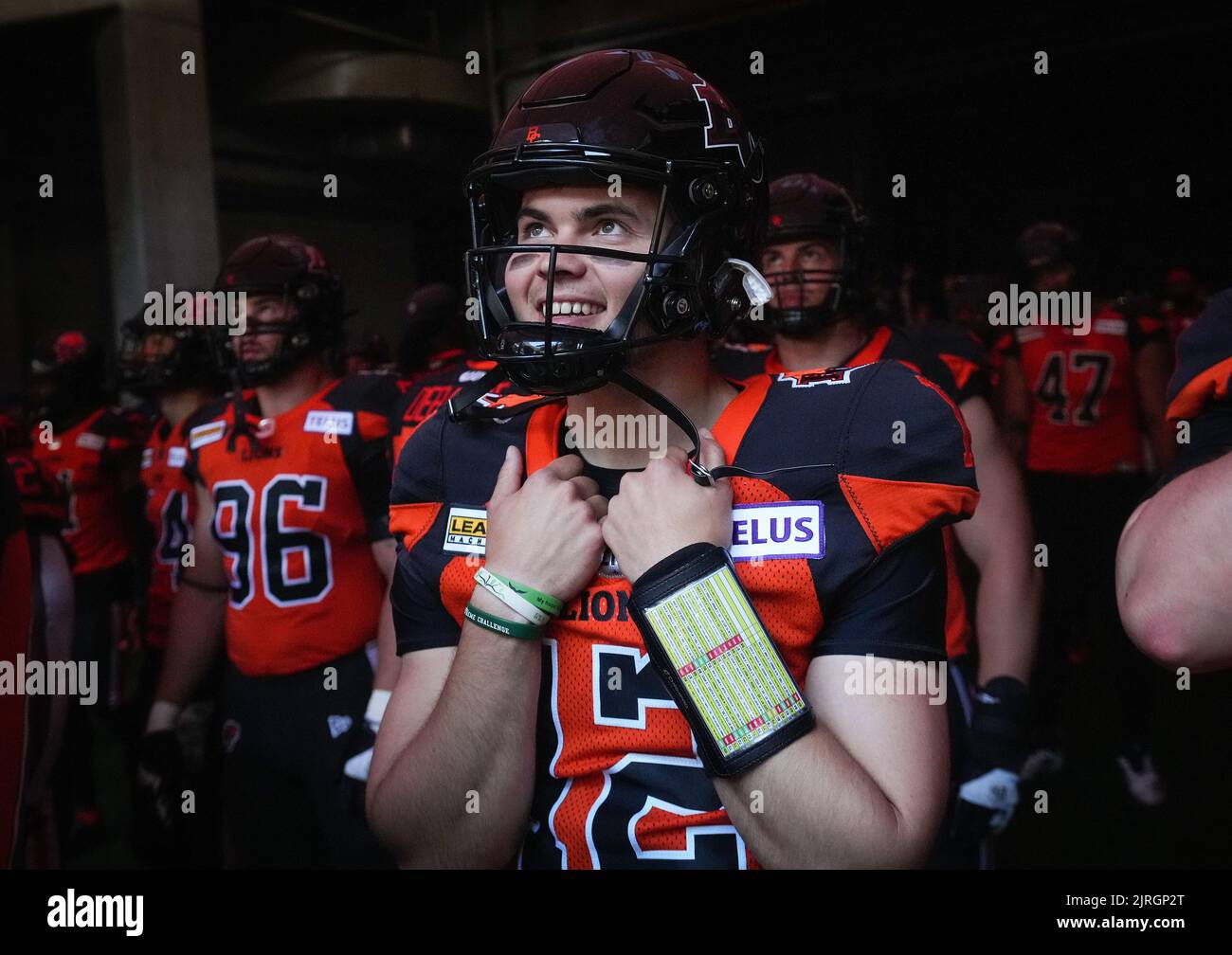 B.C. Lions quarterback Nathan Rourke (12) waits to run onto the field ...