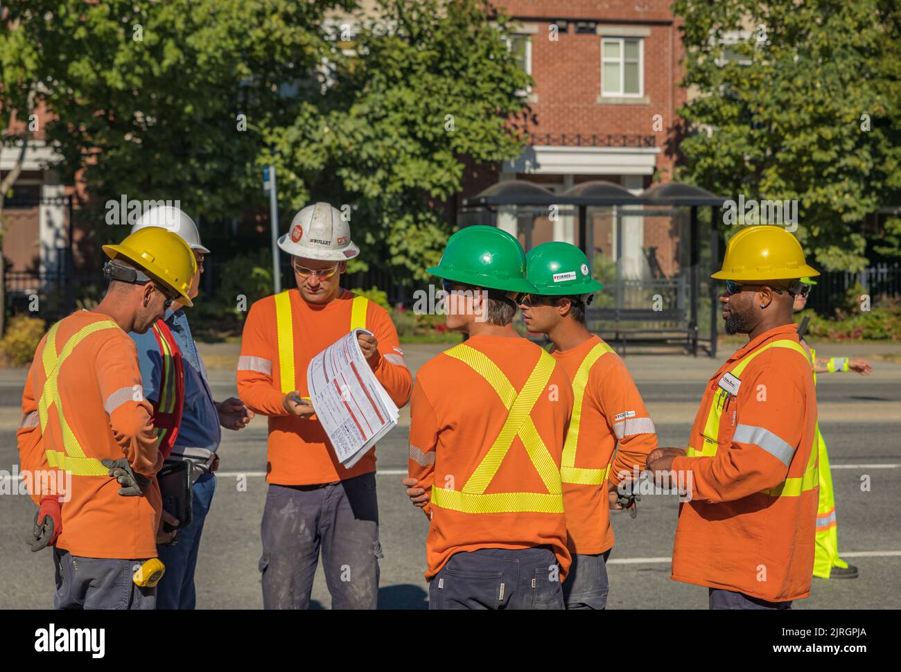 Road worker construction. Road workers inspecting construction ...