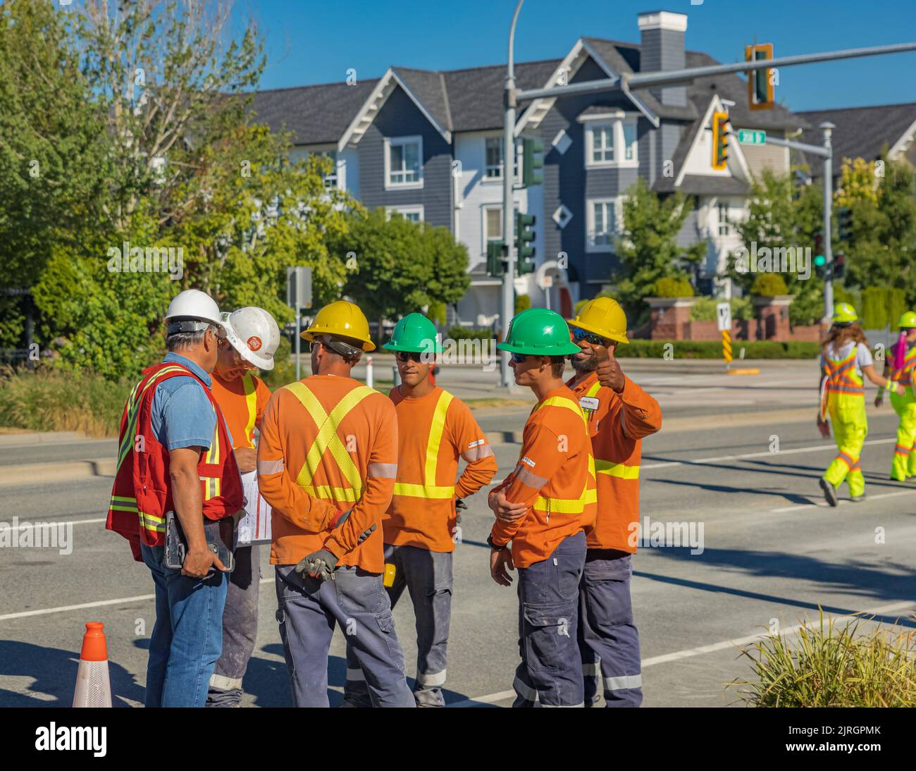 Road worker construction. Road workers inspecting construction ...