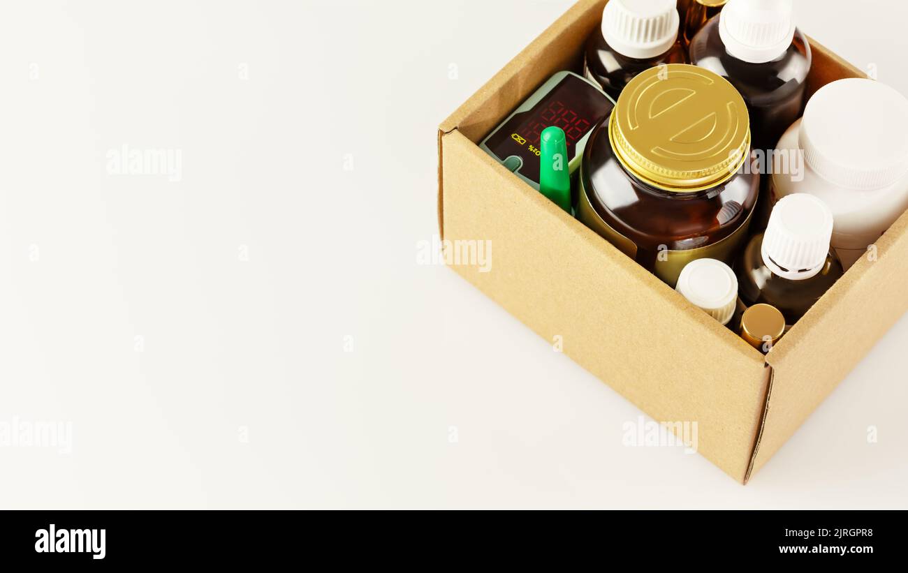 Carton box with set of medicines and vitamins. Humanitarian aid for ...