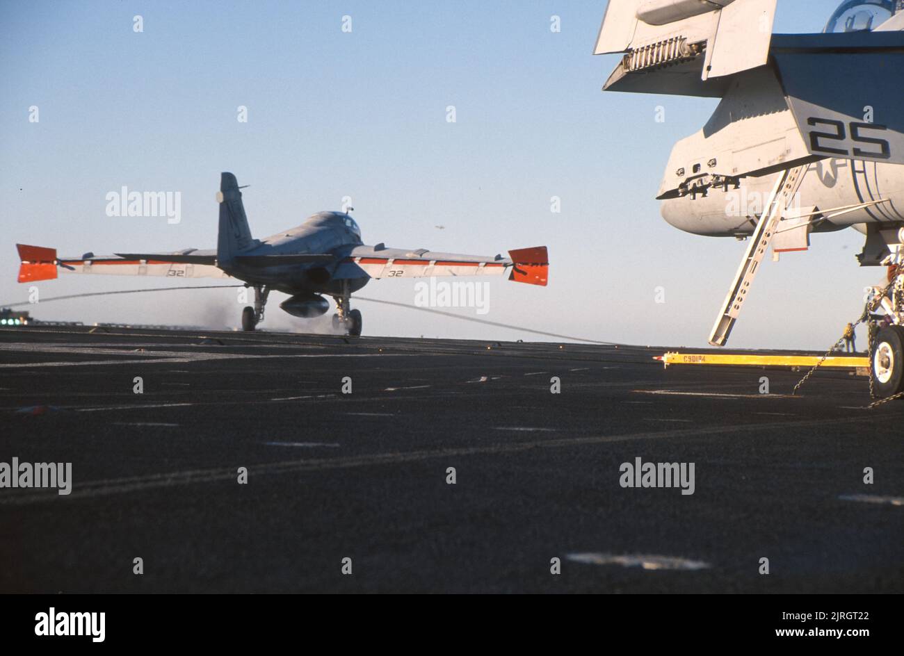 Grumman A-6 Intruder comes to a stop after catching the three-wire ...