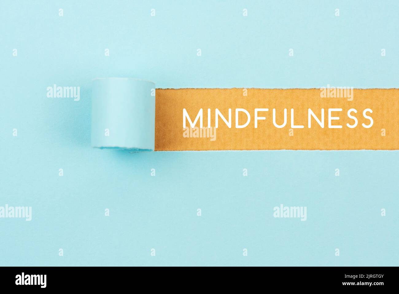 Mindfulness text on torn brown paper Stock Photo - Alamy
