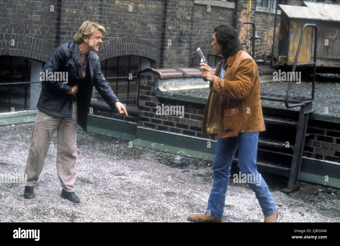 KIEFER SUTHERLAND, LOU DIAMOND PHILLIPS, RENEGADES, 1989 Stock Photo ...