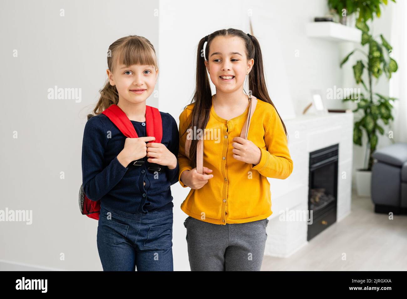 Two pupils of elementary school, Back to school Stock Photo - Alamy