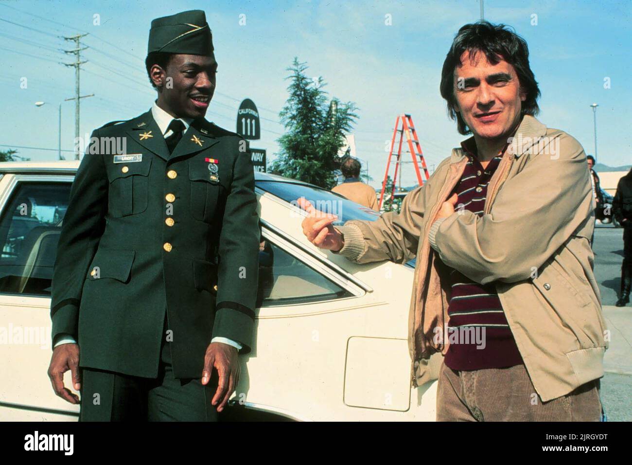 EDDIE MURPHY, DUDLEY MOORE, BEST DEFENSE, 1984 Stock Photo - Alamy