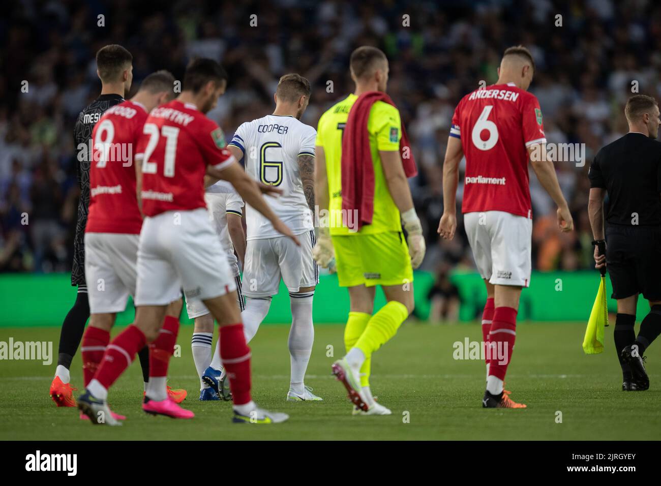 Liam Cooper #6 of Leeds United leads his team out ahead of this evening ...