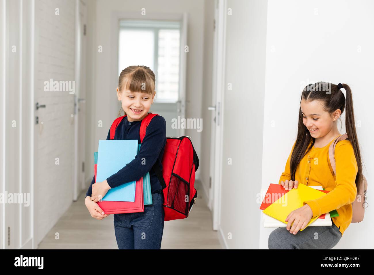 Two childrens going to school hi-res stock photography and images - Alamy