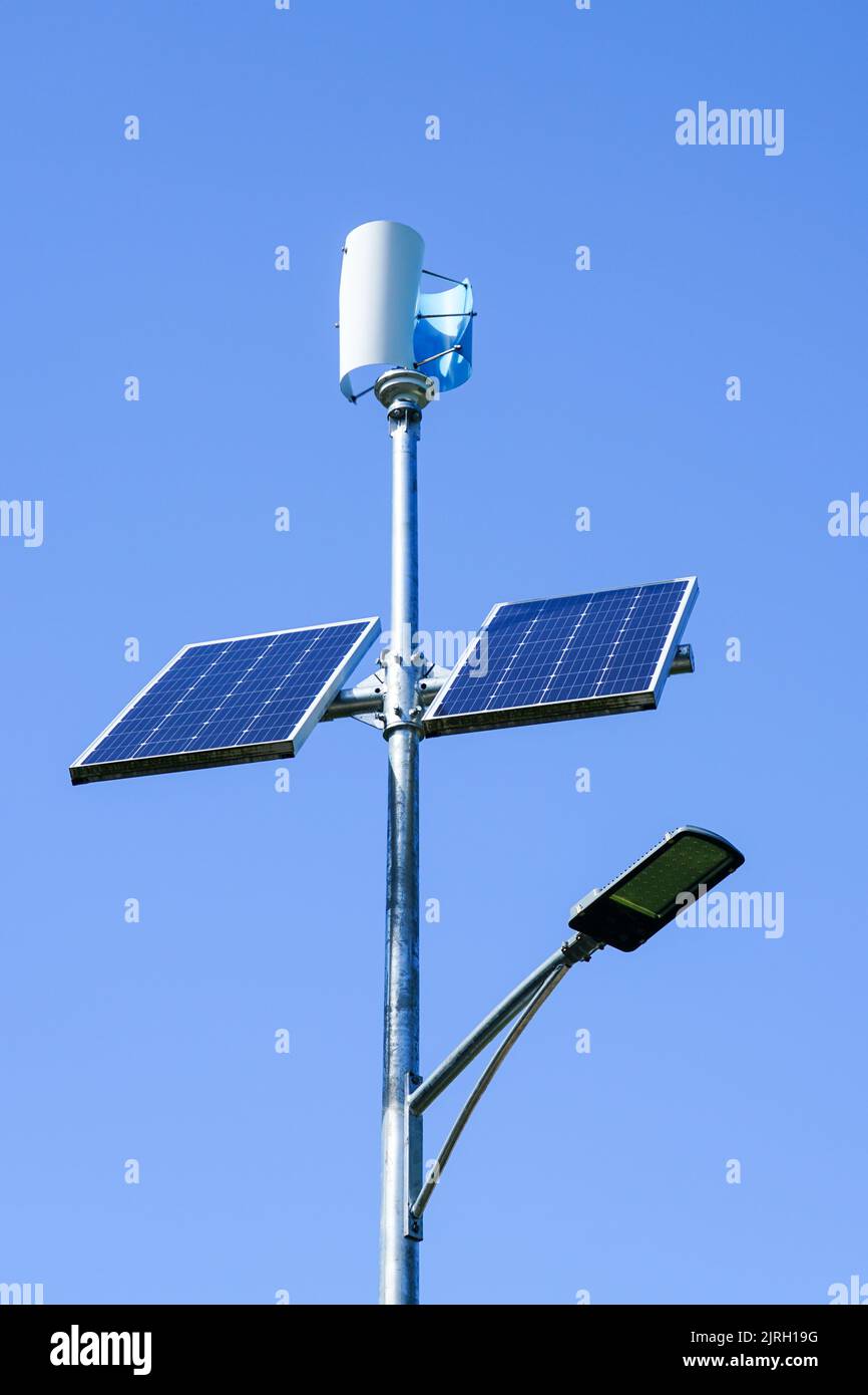 Pole with innovative LED street light powered by solar cells and small ...