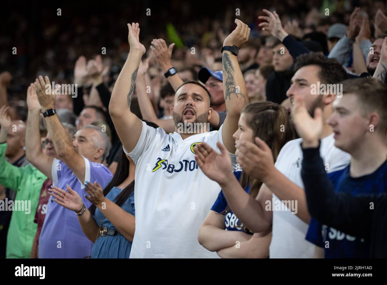 Leeds, UK. 24th Aug, 2022. Leeds United supporters cheer on their team ...