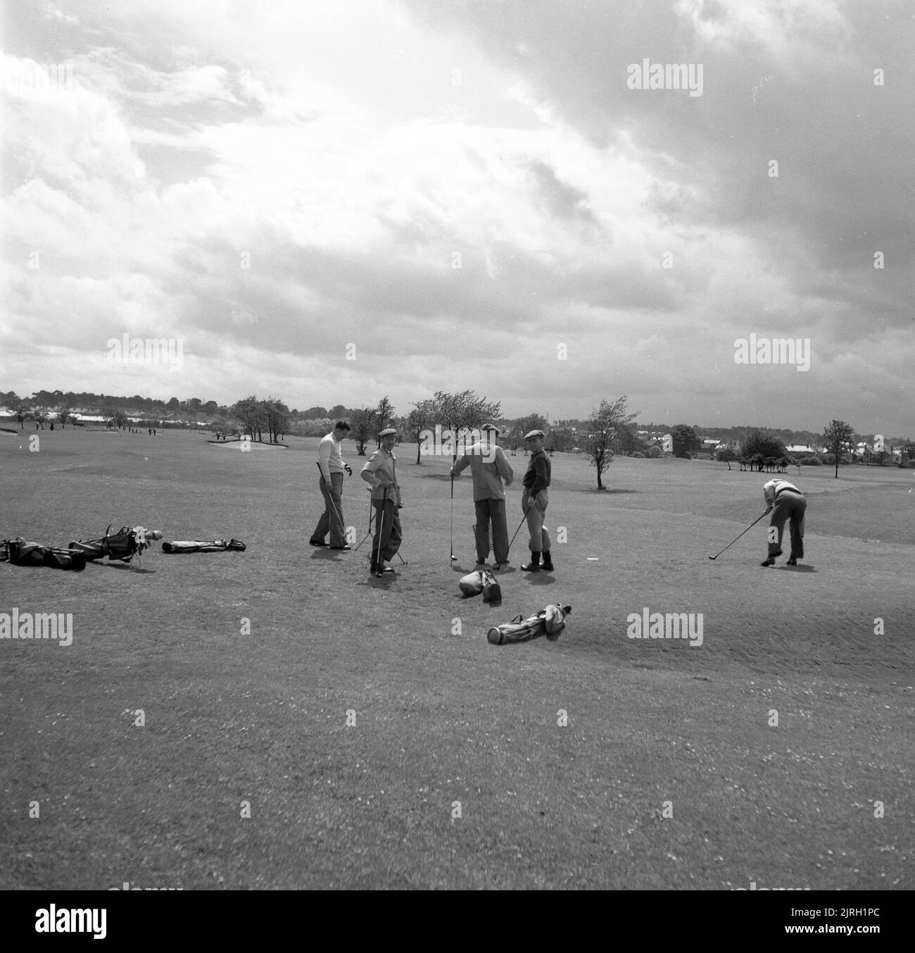 1950s, historical, male golfers on a tee at the Balmoral Golf Club ...
