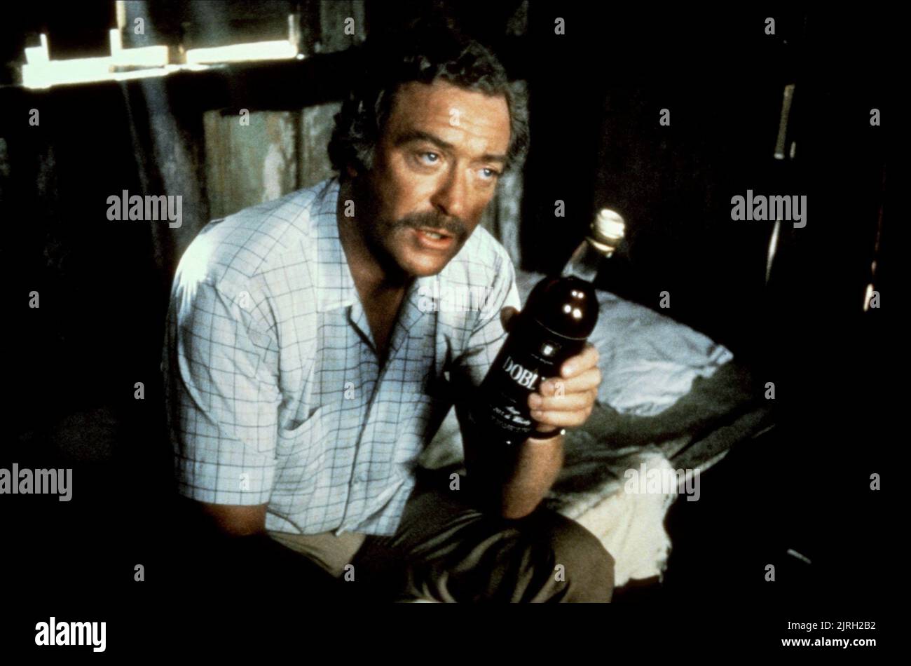 MICHAEL CAINE, THE HONORARY CONSUL: BEYOND THE LIMIT, 1983 Stock Photo ...