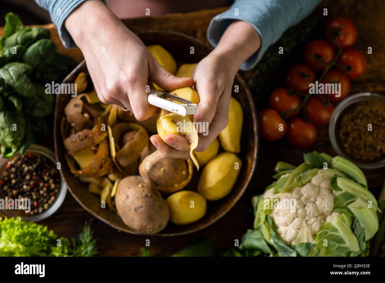 Woman peeling potatoes various hi-res stock photography and images - Alamy