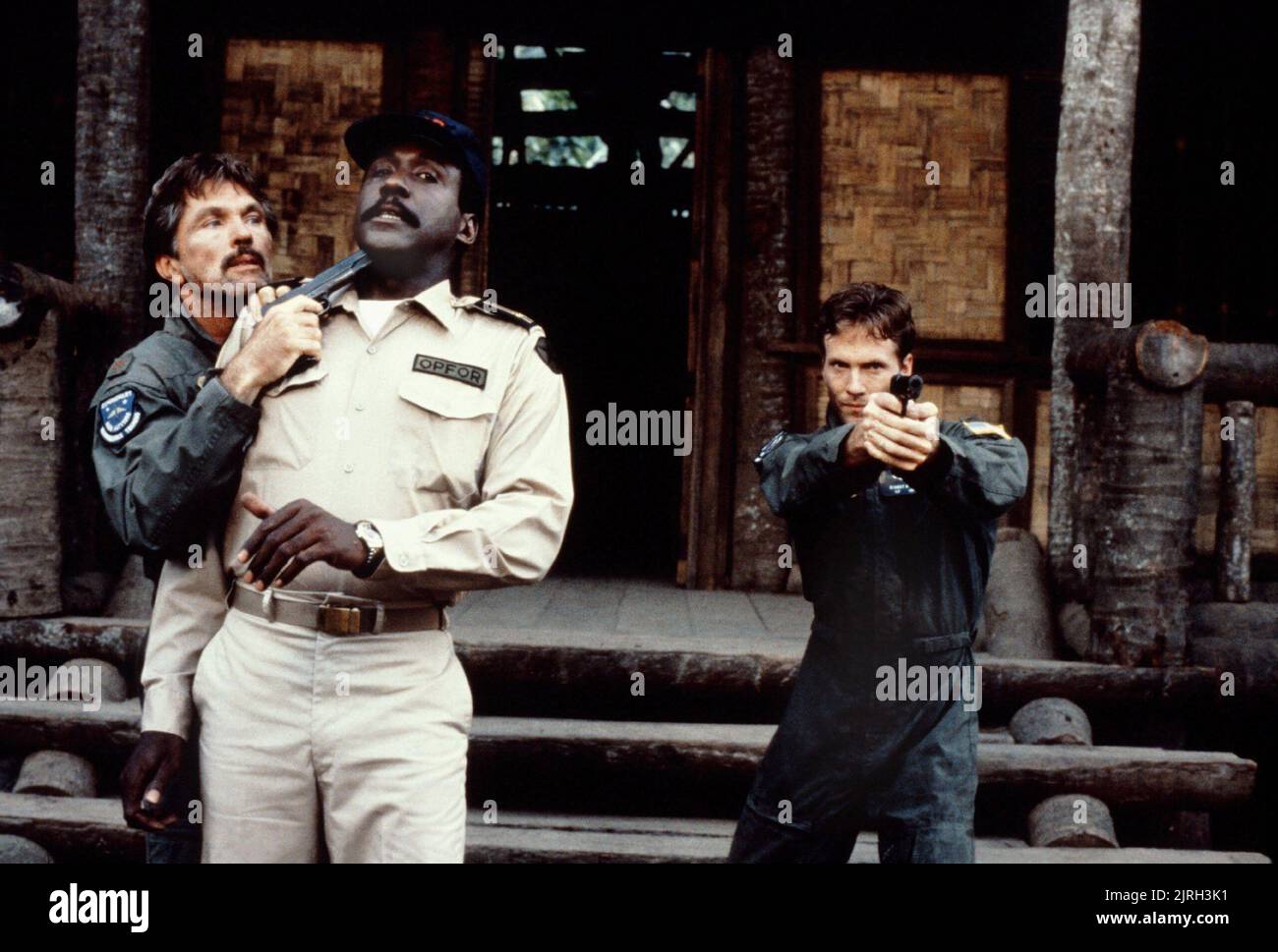 SCENE TOM SKERRITT, RICHARD ROUNDTREE, OPPOSING FORCE, 1986 Stock Photo ...