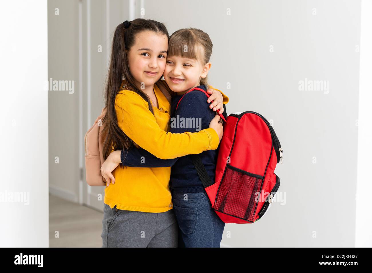 Two pupils of elementary school, Back to school Stock Photo - Alamy