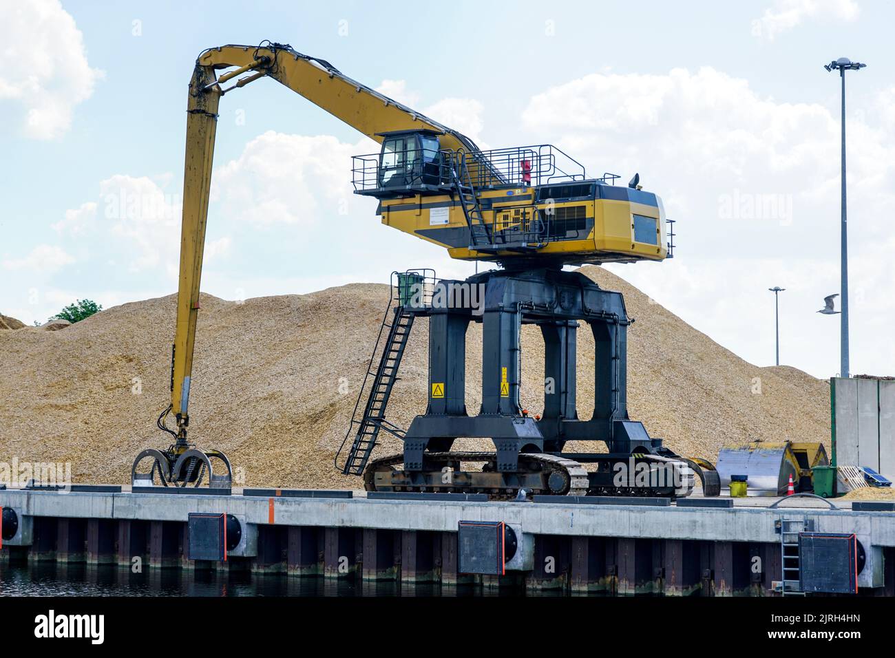 A large multi-dock cargo handler for loading and unloading ships and ...