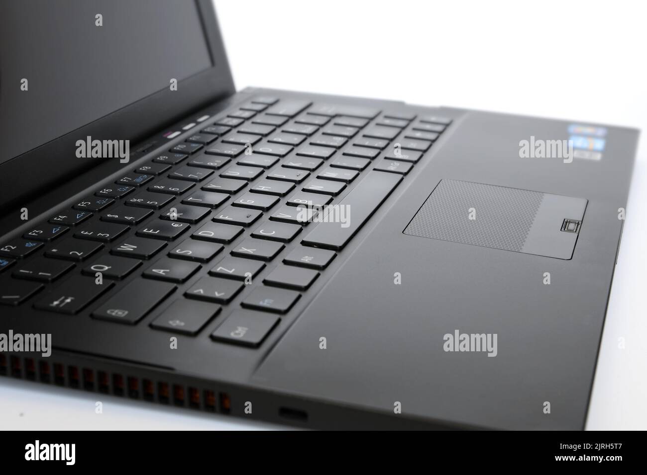close up on notebook keyboard on white background Stock Photo - Alamy