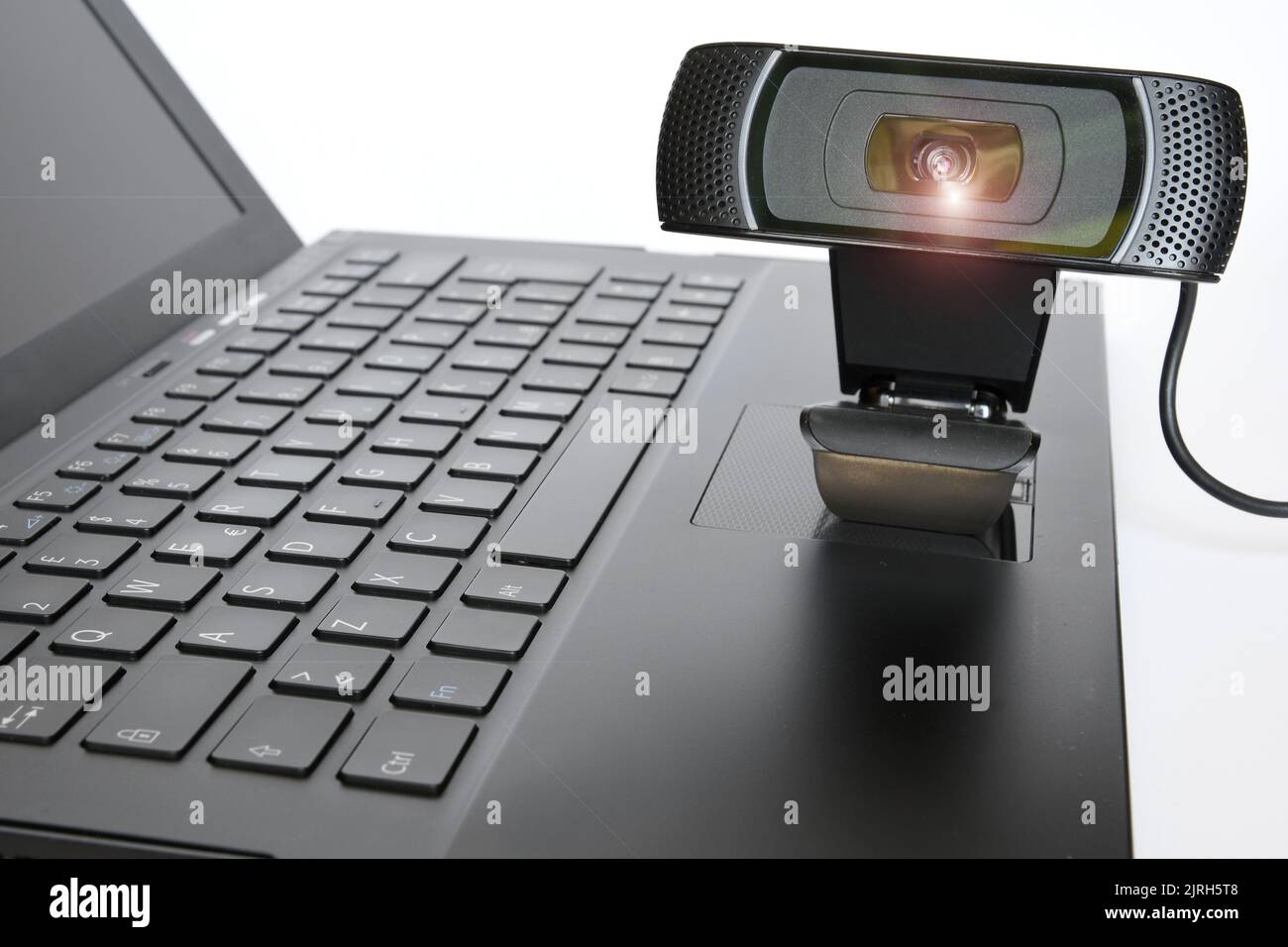 Black computer webcam on notebook keyboard Stock Photo - Alamy