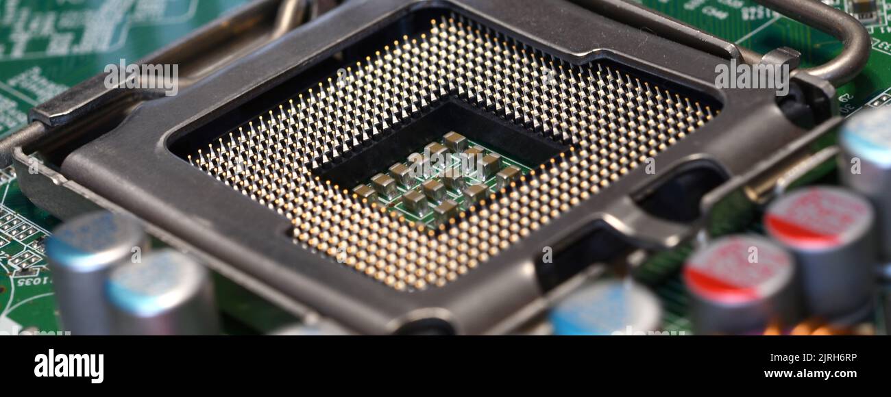 Detail of cpu socket on a modern computer motherboard. Electronic small ...