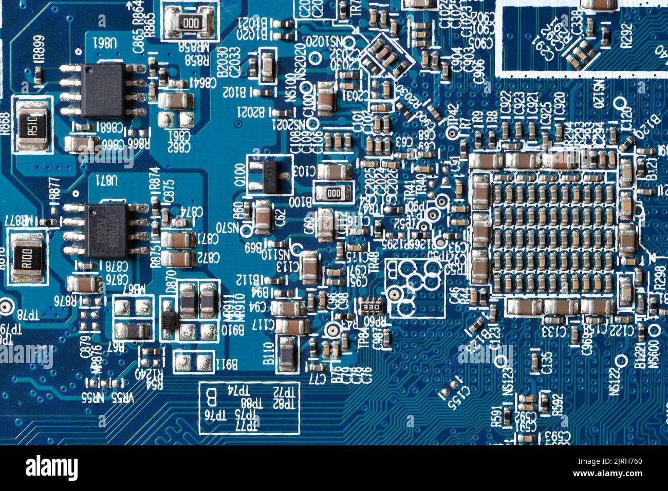 Detail of electronic components and microchips on a video card. Latest ...