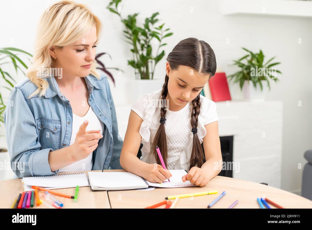mother daughter study together at home Stock Photo - Alamy