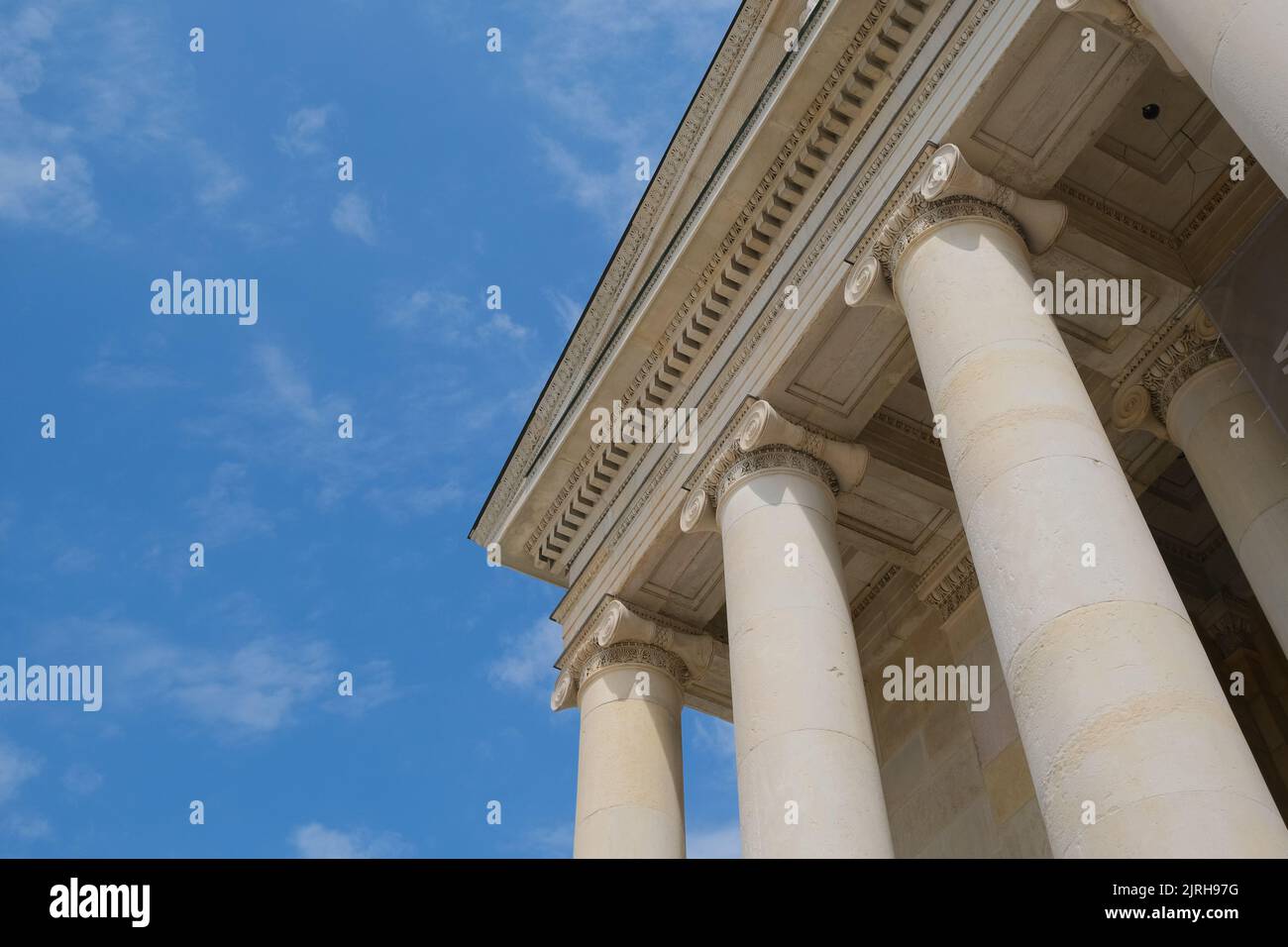 classical architecture old stone columns among blue sky Stock Photo - Alamy