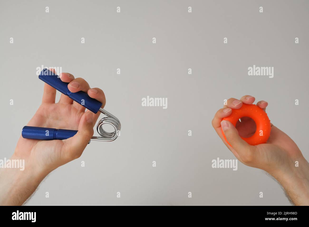 man hands holding gym wrist strength exerciser, wrist rehabilitation ...