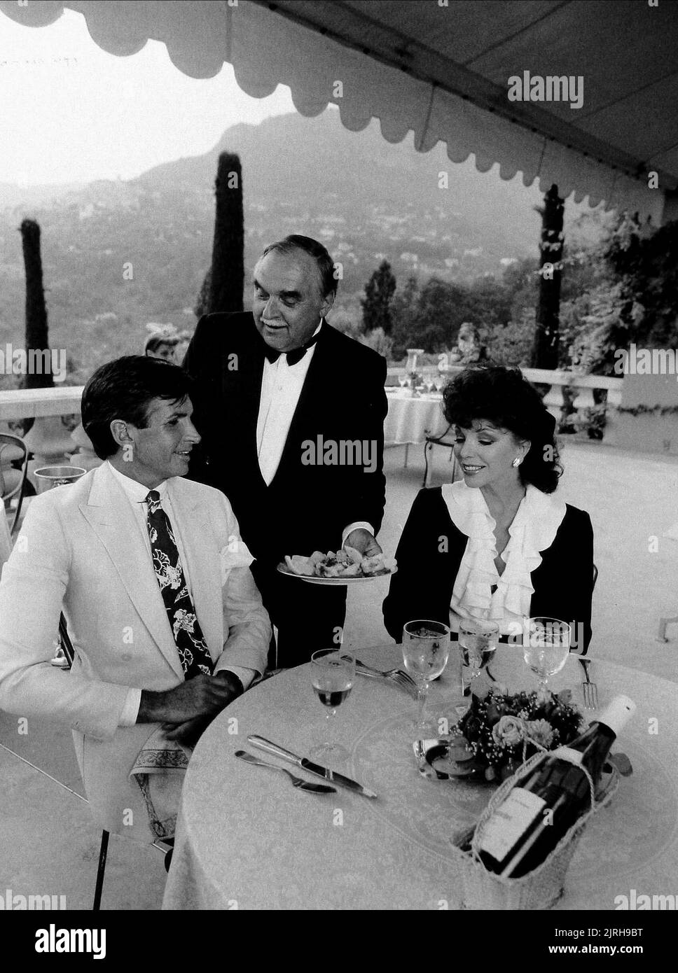 GEORGE HAMILTON, JOAN COLLINS, MONTE CARLO, 1986 Stock Photo - Alamy