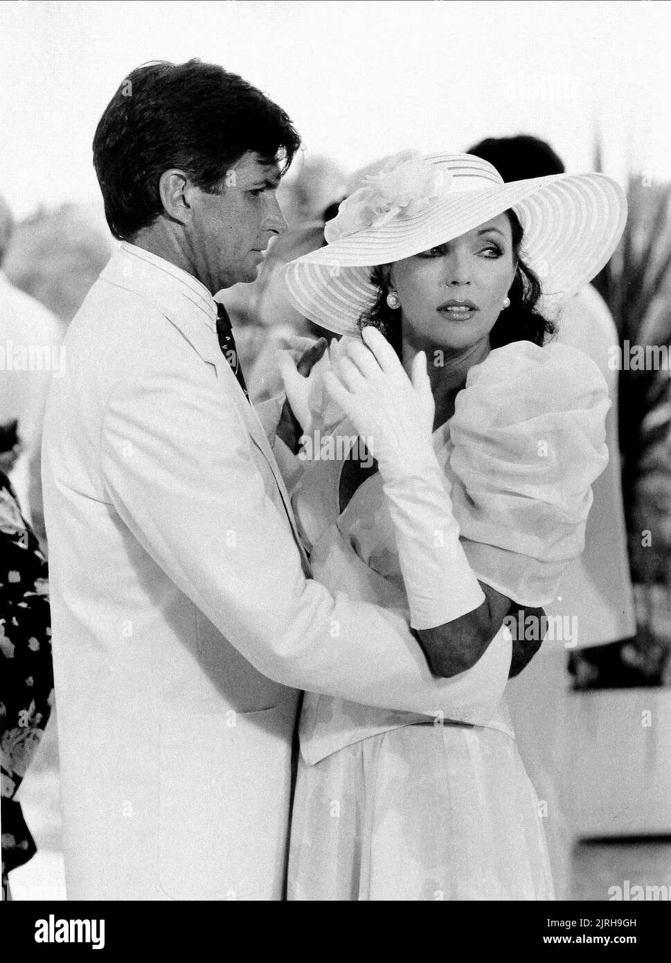 GEORGE HAMILTON, JOAN COLLINS, MONTE CARLO, 1986 Stock Photo - Alamy