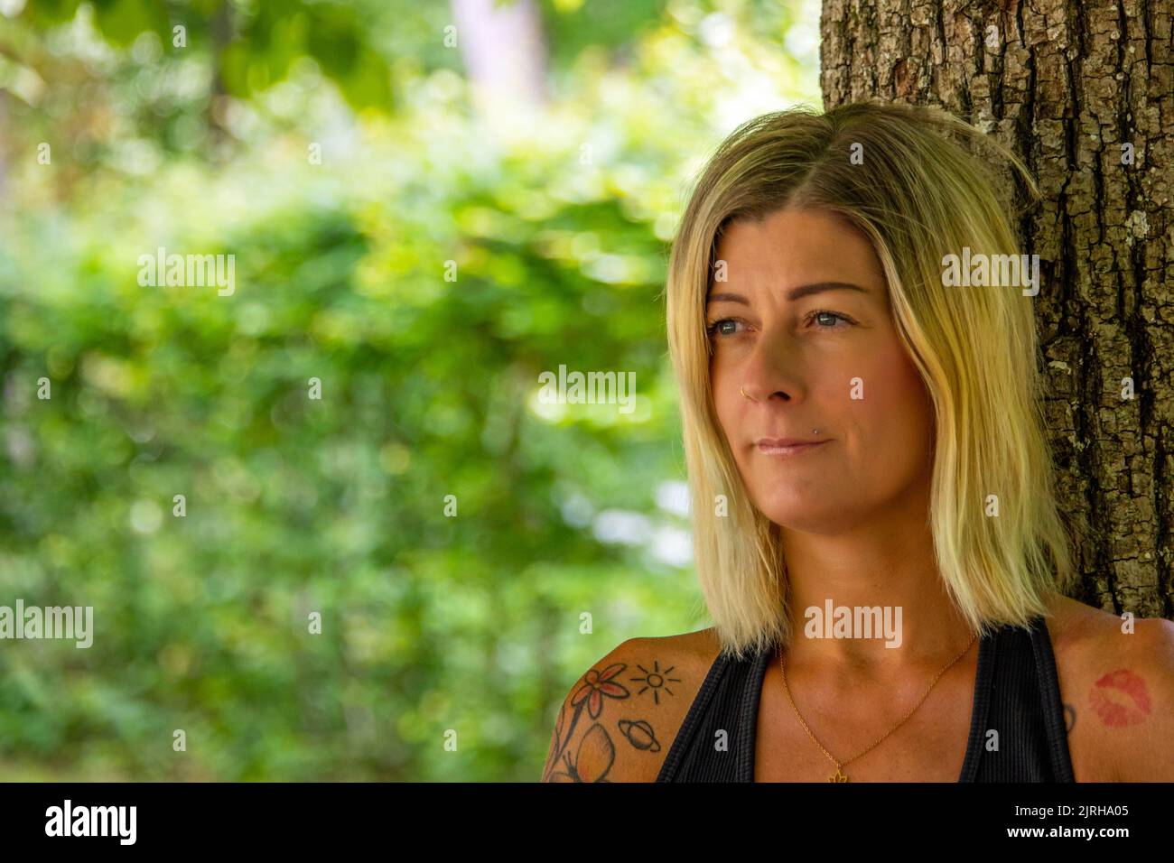 Head shot of a blond european woman with face expression Stock Photo ...