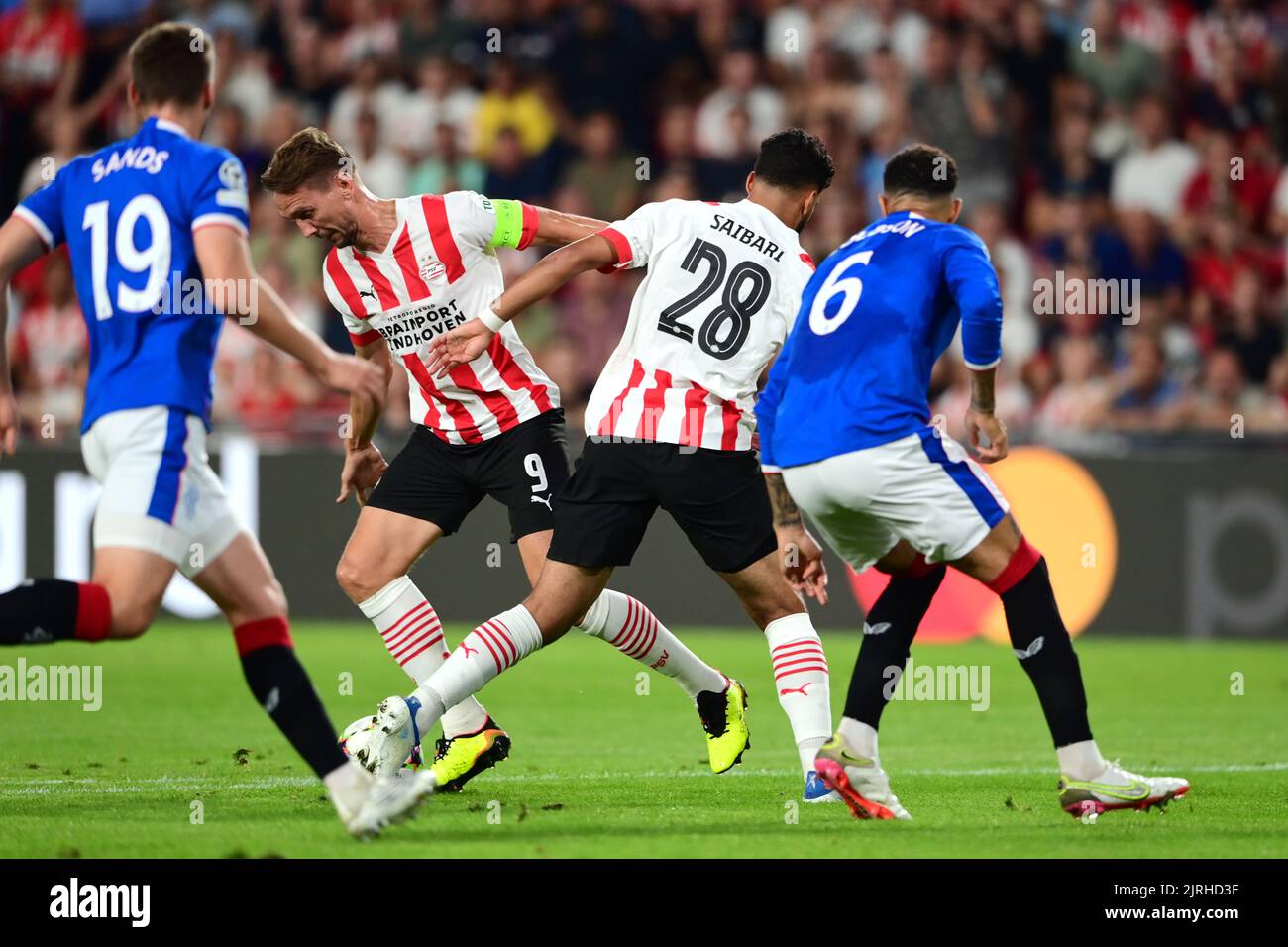 EINDHOVEN - (lr) James Sands of Rangers FC, Luuk de Jong of PSV ...