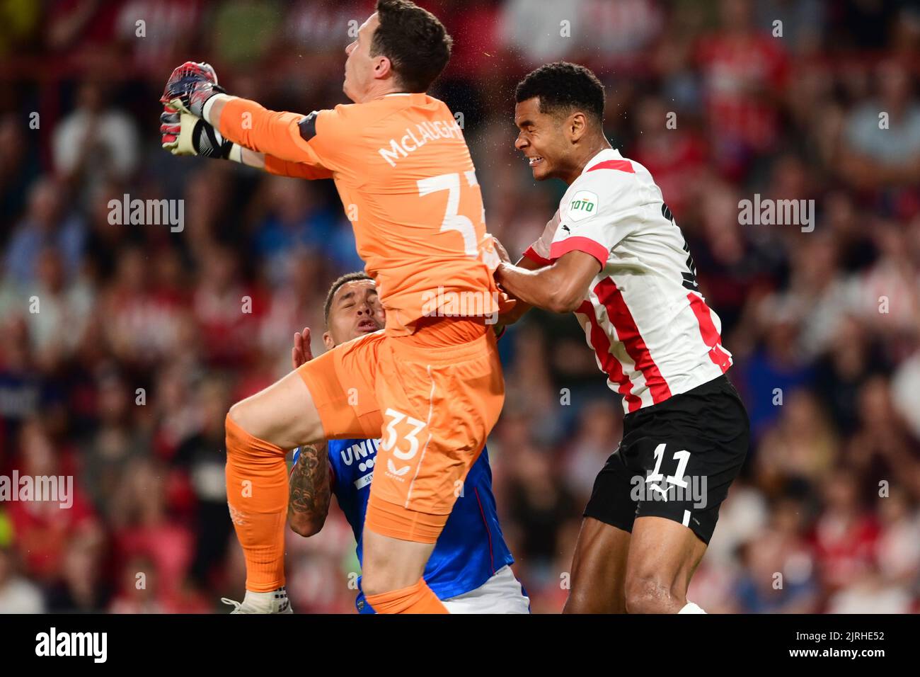 EINDHOVEN - (lr) Rangers FC goalkeeper Jon McLaughlin, Cody Gakpo of ...