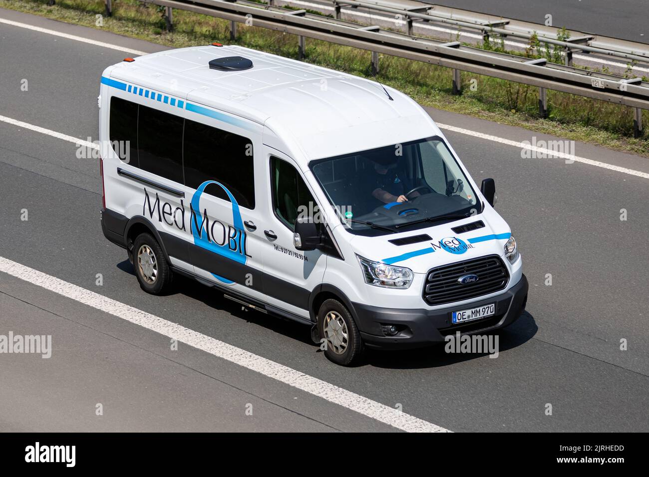Med Mobil Ford Transit minibus on motorway Stock Photo - Alamy