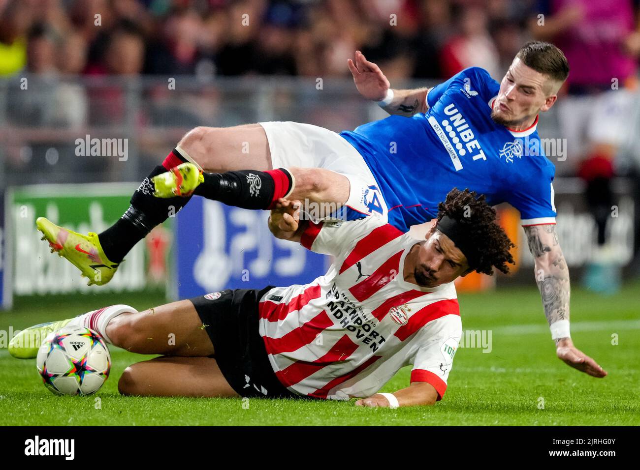 EINDHOVEN, NETHERLANDS - AUGUST 24: Ryan Kent of Rangers is challenged ...