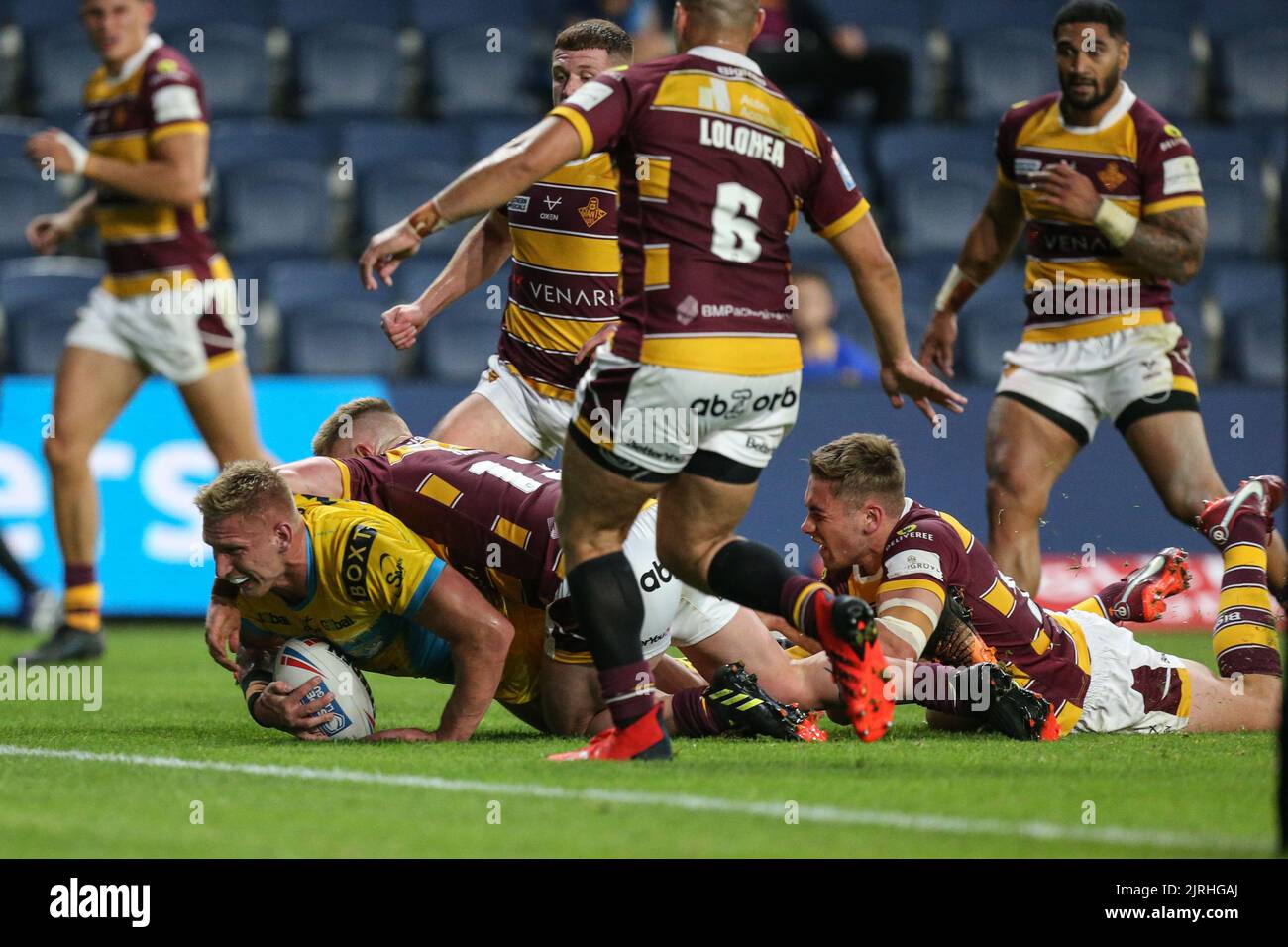Mikolaj Oledzki #8 of Leeds Rhinos looks to stretch for the try line ...