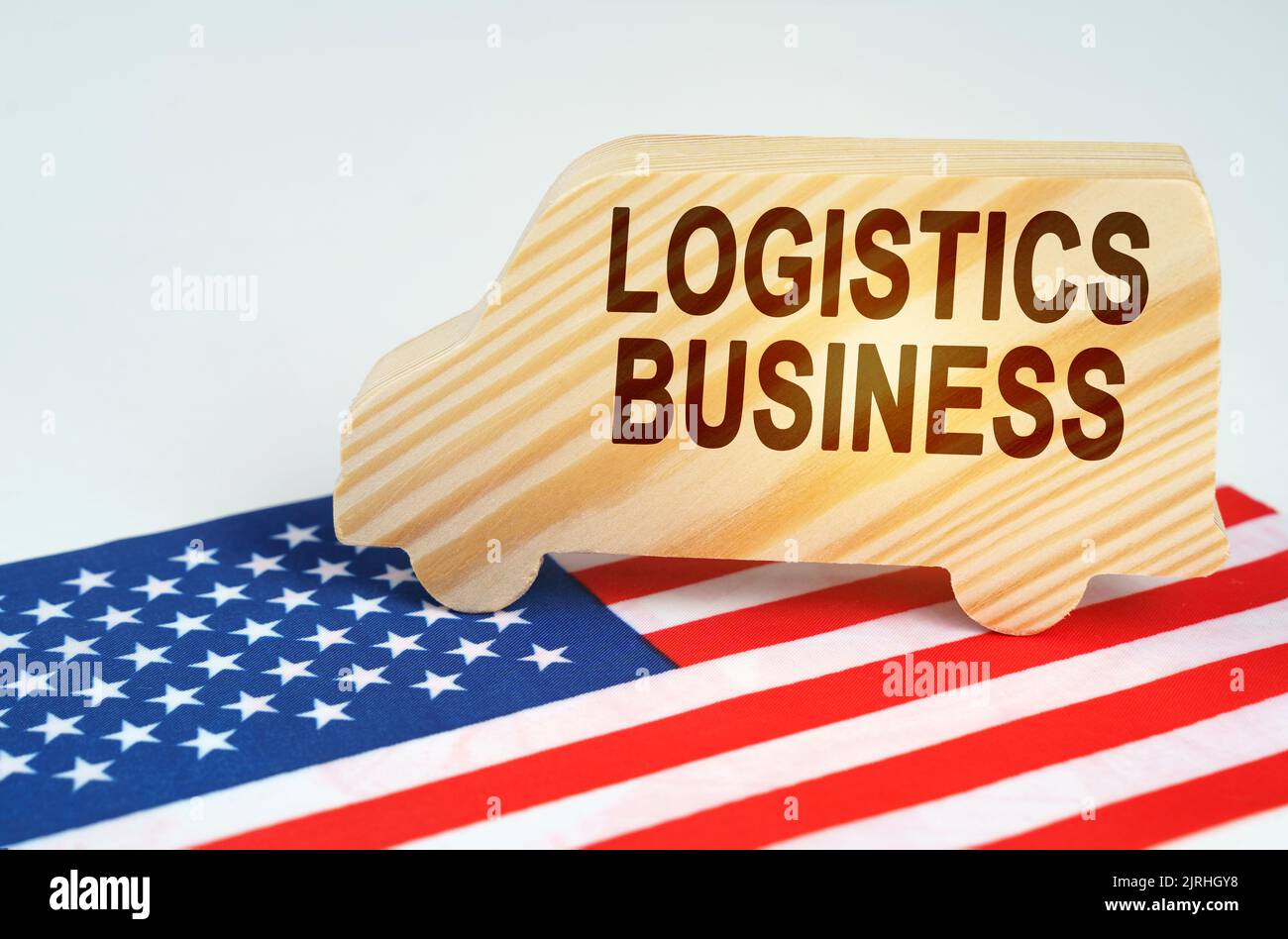 The concept of cargo transportation and logistics. On the US flag is a ...