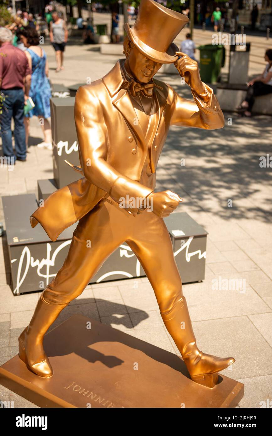 Statue of johnnie walker striding man hi-res stock photography and ...
