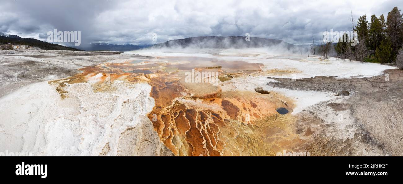 Hot spring Geyser with colorful water in American Landscape Stock Photo ...