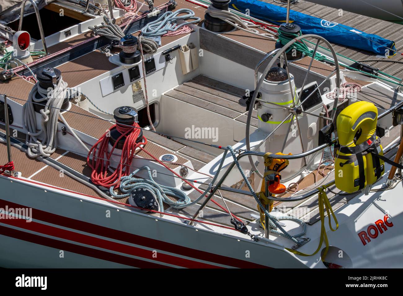 cockpit of a large state of the art racing yacht in the marina during ...