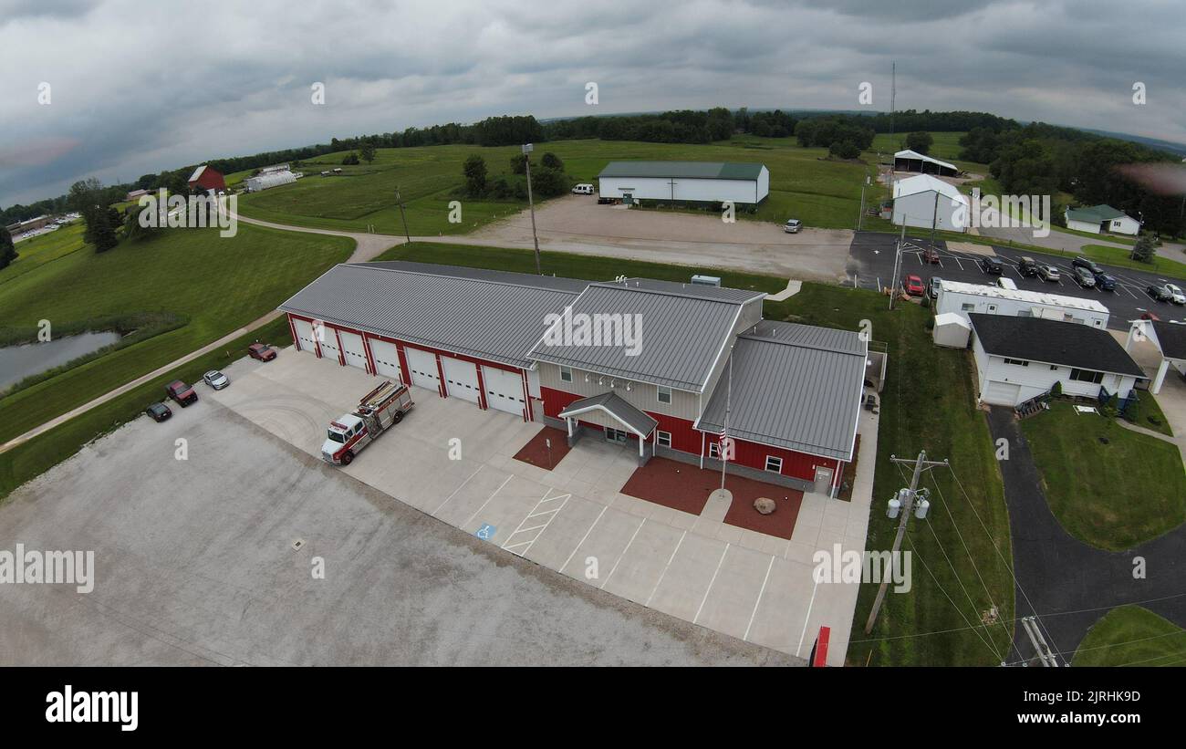 An aerial panoramic view of a big building in a remote neighbourhood ...