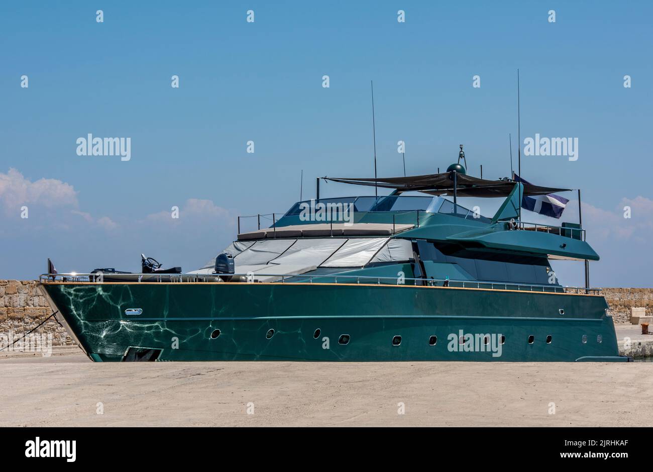 large stae-of-the-art motorboat superyacht in the harbour at zante town ...