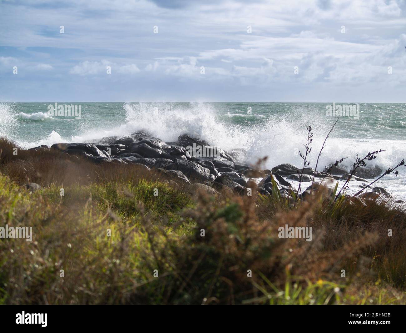 Wave sending spray into air hi-res stock photography and images - Alamy
