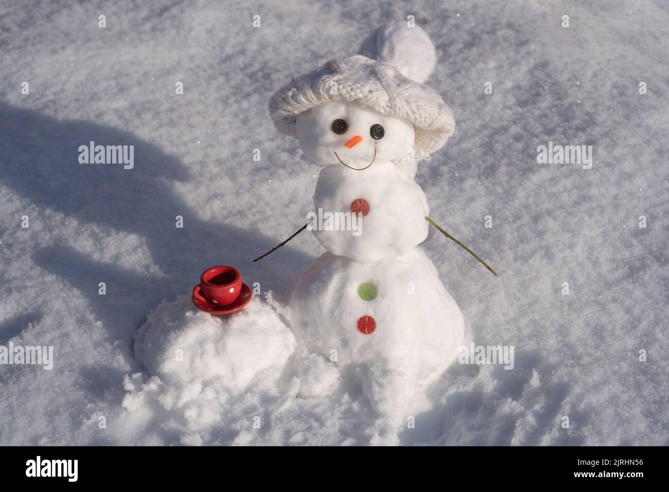 Snowman with cup coffee. Snow man isolated on snow background Stock ...